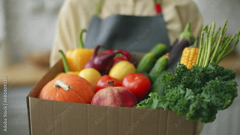 organic fresh food. a cardboard box with groceries close up. online ...