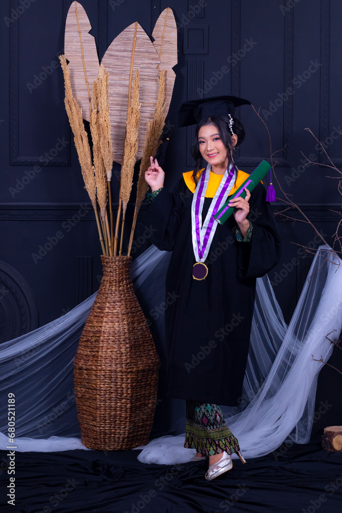Beautiful mature Asian girl graduating candid, cheerful smile, hand ...