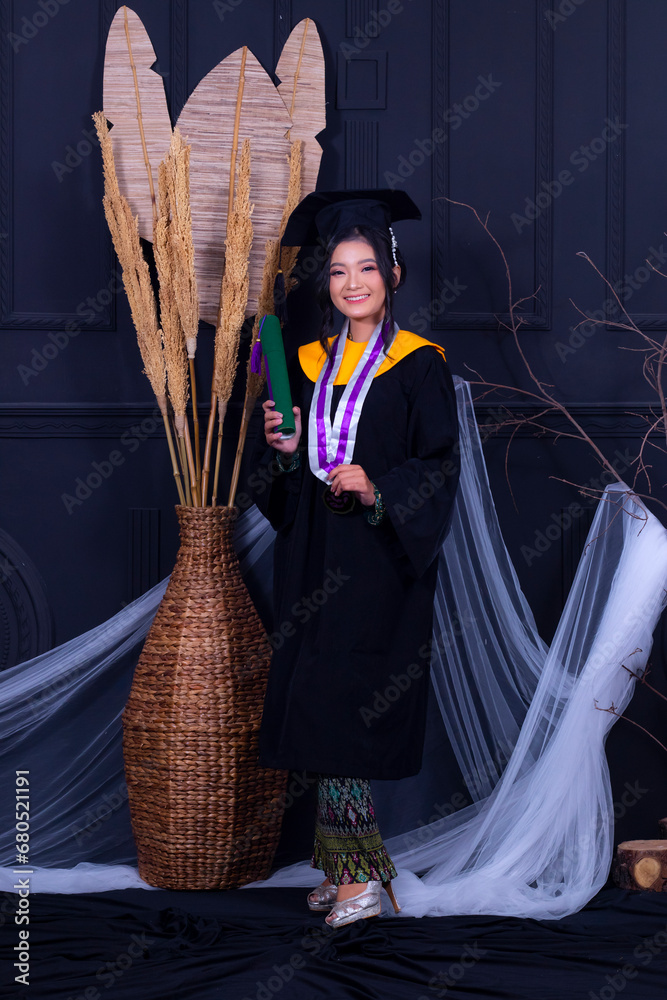 Beautiful mature Asian girl graduating candid, cheerful smile, hand ...