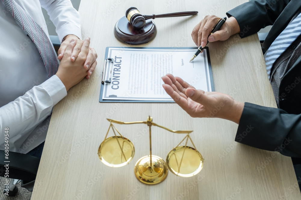 Lawyer hand holding pen and providing legal consult business dispute ...