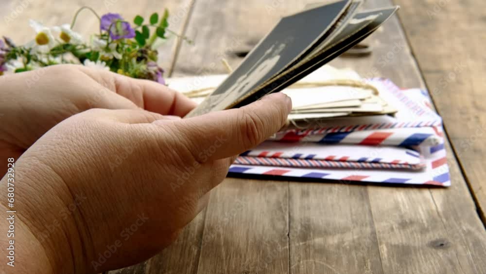 female hand hold old family photos, stack of old family vintage ...