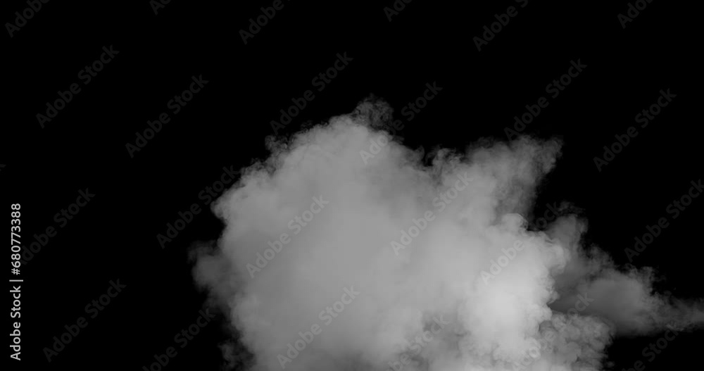 Slow-motion video with cloud of white fog or smoke set against dark ...