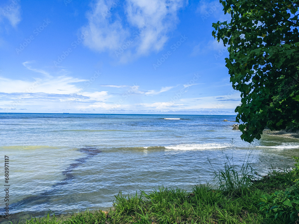 Costa Rican Beaches in the low season. sunny skies and blue waters with ...