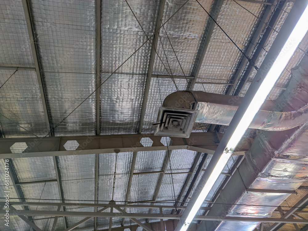 The ceiling is covered with aluminum foil, creating a shiny and ...