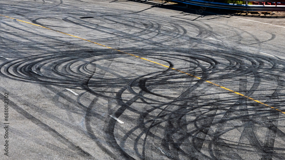 Top view curving tire marks from professional car drifting on asphalt ...