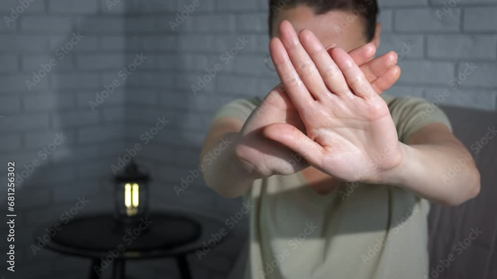 Lady put hands in stop gesture. A stressed woman show a stop gesture ...