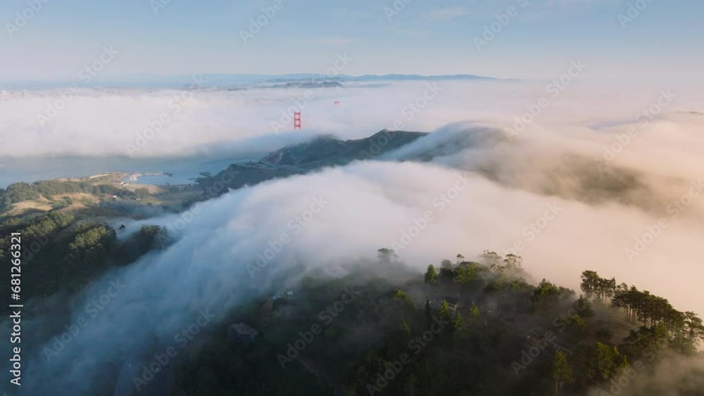 Overhead shot of Golden Gate Bridge drowning in thick fog at the ...
