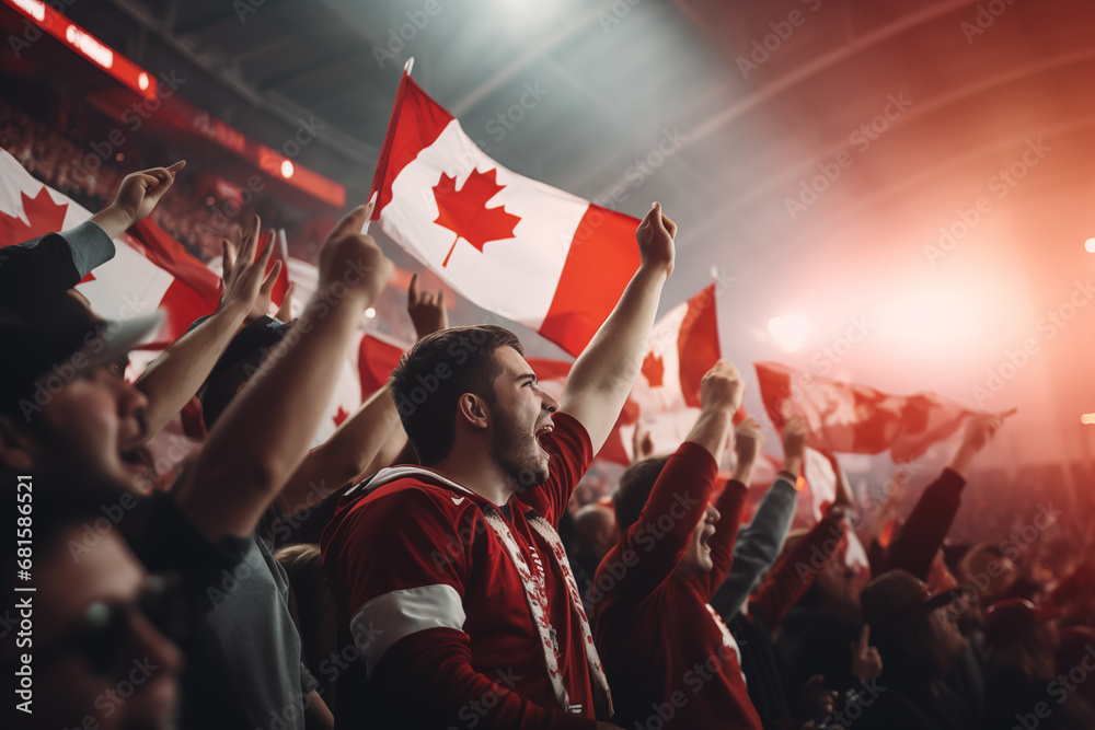 Canadian fans cheering on their team from the stands Stock Photo ...