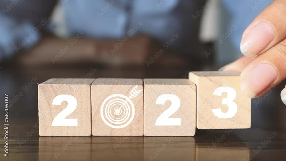 2023 year change to 2024 year block with dartboard icon. Goal, Target, Resolution, strategy ...