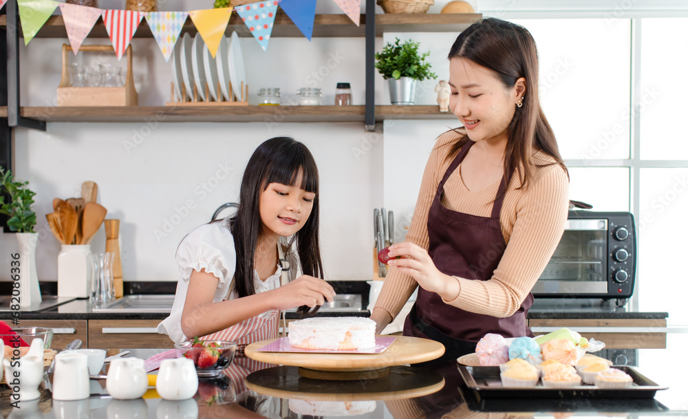 Asian beautiful female baker pastry chef mother wears apron standing ...
