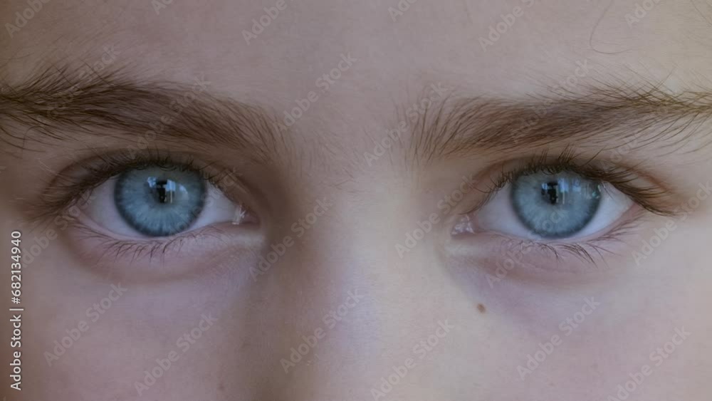 Blue Eye of Child Looking at Camera Close Up. Macro Shot Opening and ...