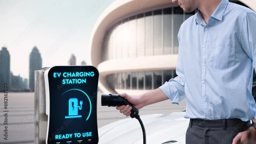 Vidéo Stock Hand pull EV charger from smart electric charging station ...