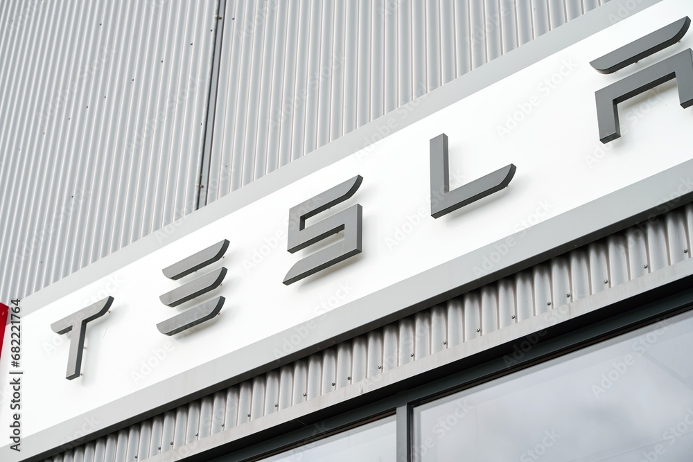 Europe, Norway 09.22.2023 Tesla logo sign on the building. Electrifying ...