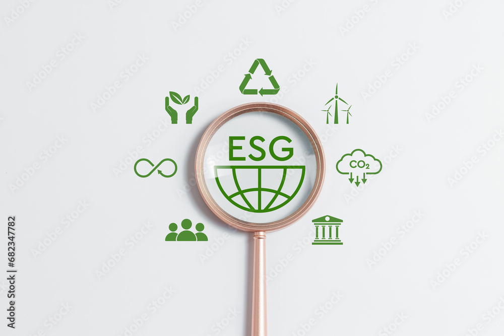 ESG environmental, social and governance. Magnifying glass focus ESG ...