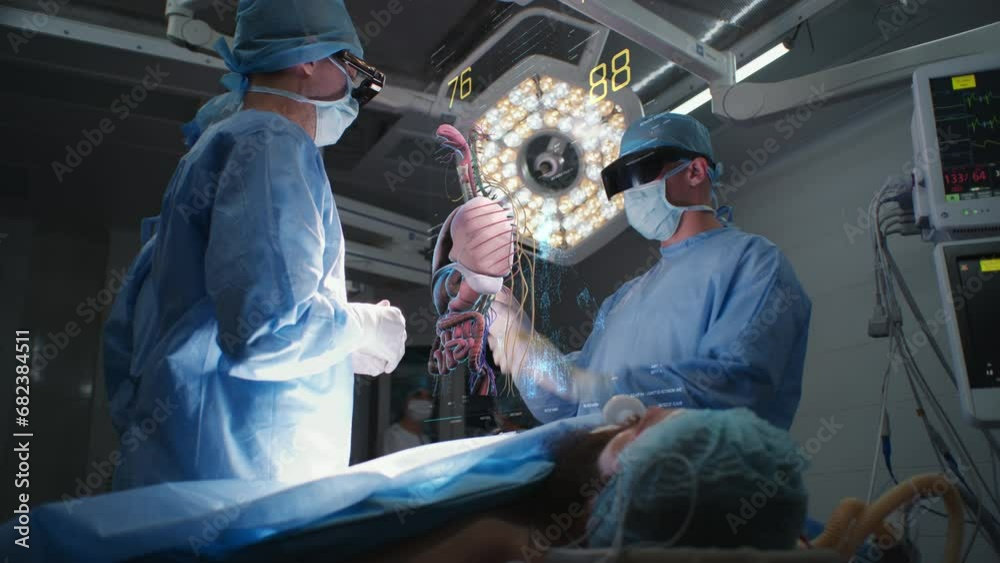 Vidéo Stock Doctors perform surgery in hospital operating room in VR ...