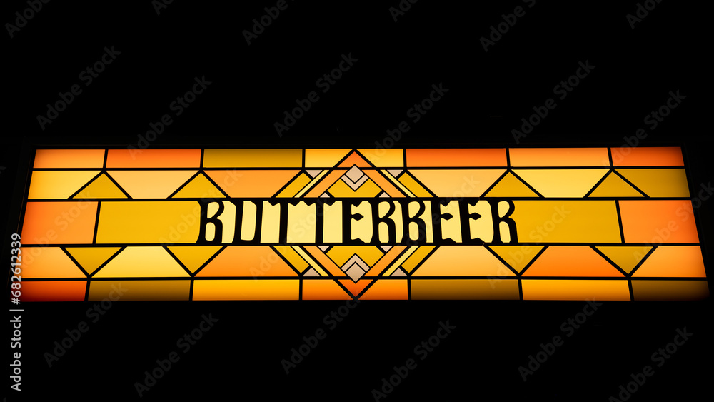 JAPAN - NOV 13, 2023: BUTTERBEER illuminated sign handwriting font logo ...