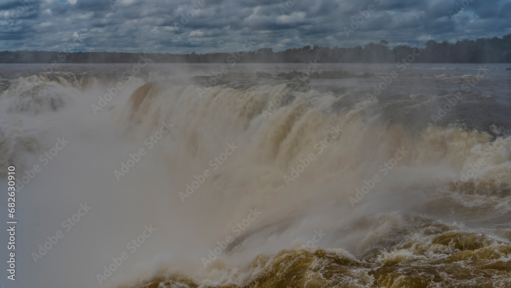 The famous impressive Devil's Throat Waterfall. Stormy streams of water ...