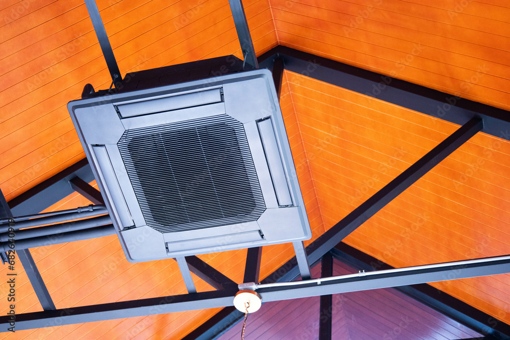 Black ceiling air conditioner. Close-up of cassette air conditioning ... Black ceiling air conditioner. Close-up of cassette air conditioning ...