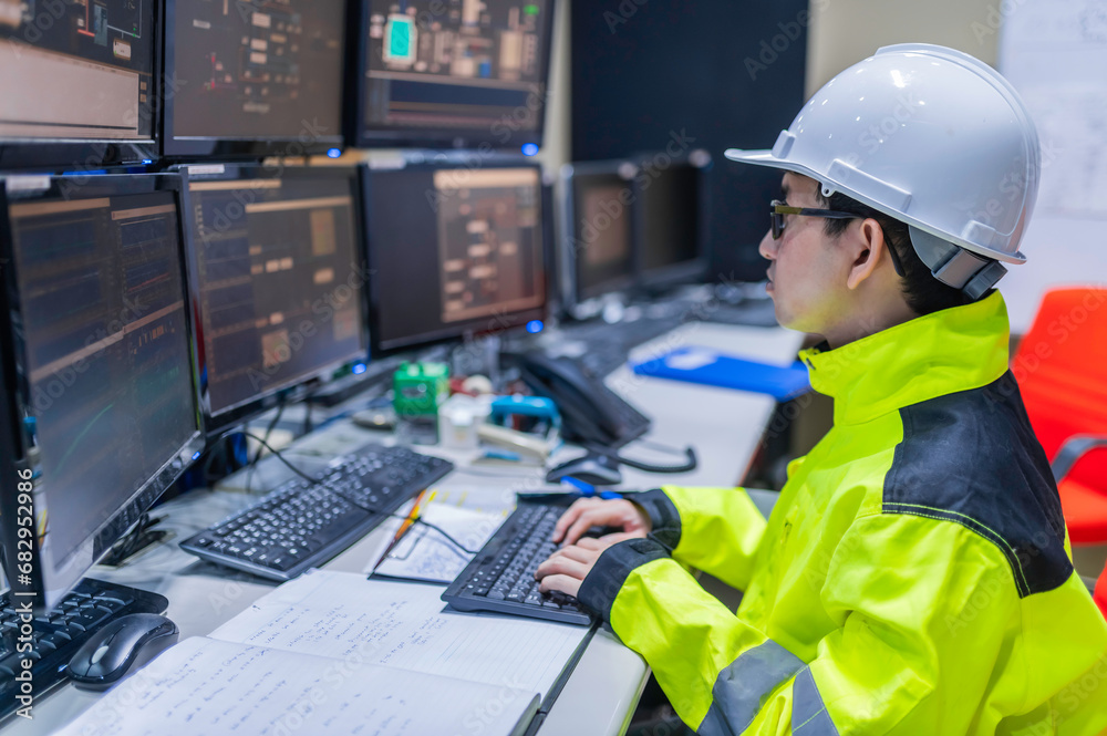 Inside the large Industry Factory Female Computer Engineer Works on ...