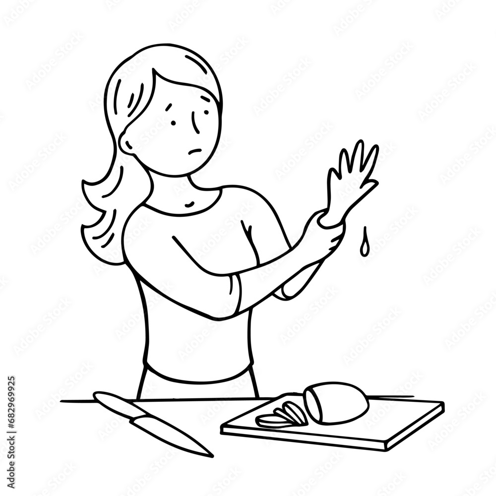 A woman cut her hand with a knife in the kitchen. Domestic domestic ...