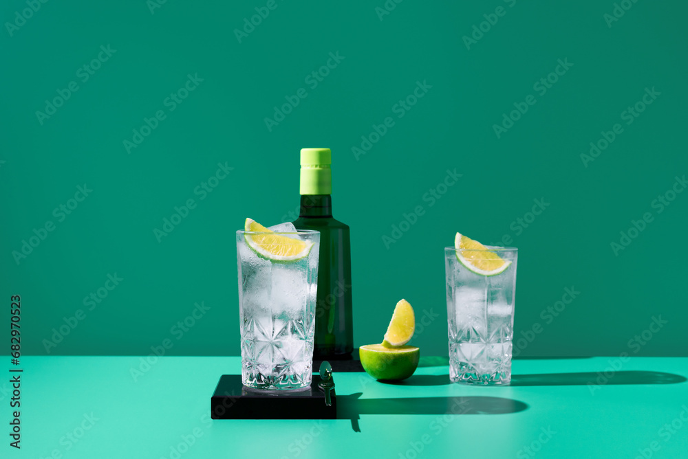 Elegant gin tonic setup with fresh lime slices Stock Photo | Adobe Stock
