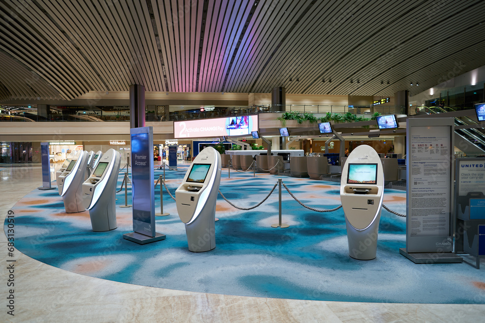 SINGAPORE - NOVEMBER 06, 2023: self check-in kiosks in Singapore Changi ...