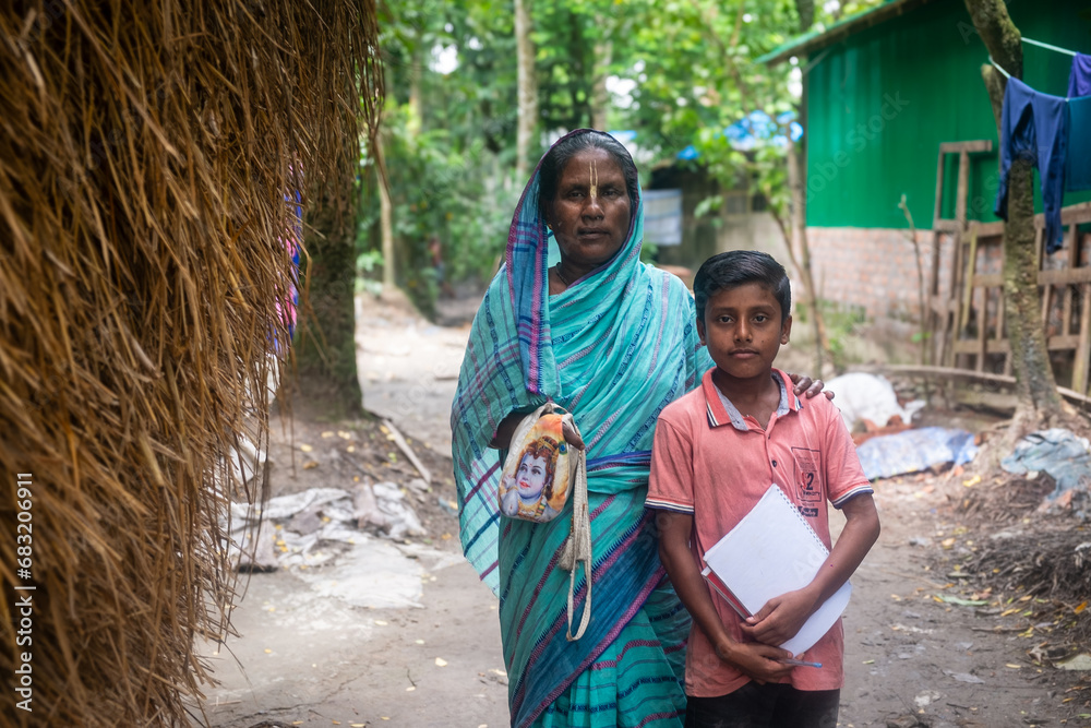South asian family photo, mother with son, teenage student with books ...
