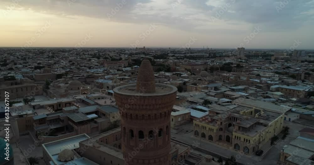 The drone flies around the minaret of the architectural complex Poi ...
