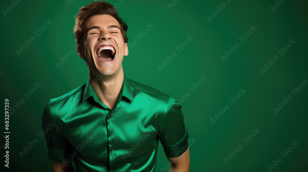 Hysterical 22 years old male actor, laughing out loud, wearing a Bright ...
