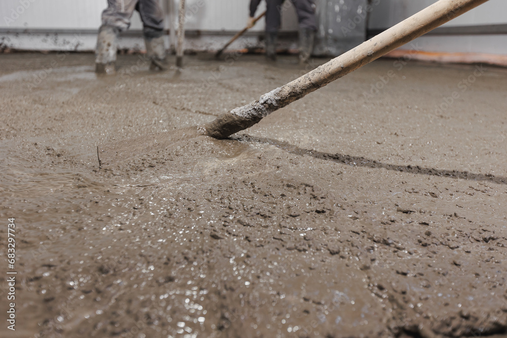 Construction site of buildings pouring cement. Top view new screed ...