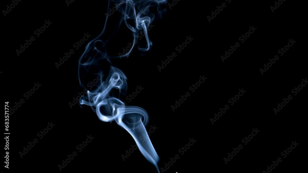 Real smoke on a black background. Thin Flexible Trickle of Real Smoke ...