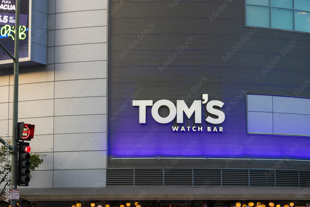 The Tom’s watch bar sign at LA Live with traffic signals in Los Angeles ...