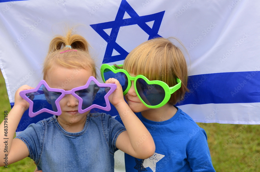 Cute boy and girl. Brother and sister are blondes against the ...