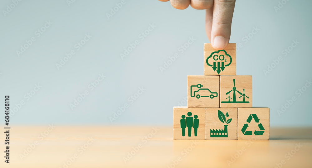 Hand putting CO2 reducing with environmental icon for decrease CO2 , carbon footprint and carbon ...