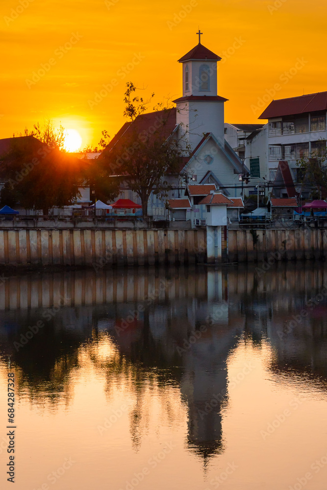 Ping riverfront with Christian Church sunrise in Chiang Mai, Thailand ...