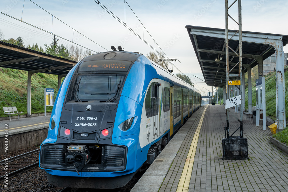 Katowice Brynow, Poland: October 24, 2023: A small railway station surrounded by a slope covered ...