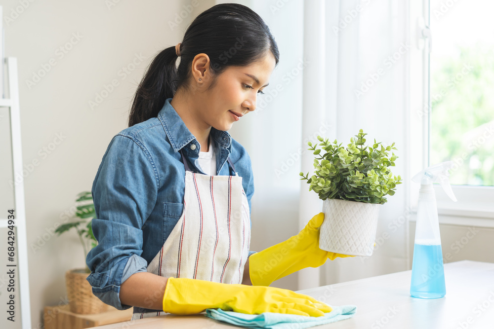 Cleaning hygiene asian young woman wearing protection rubber yellow ...