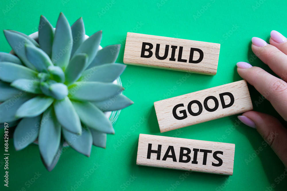 Build good habits symbol. Wooden blocks with words Build good habits ...