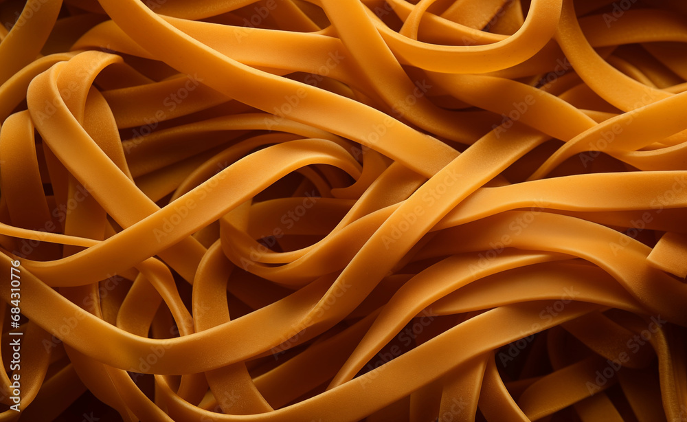 Freshly cooked homemade strand pasta, specifically spaghetti, to create ...