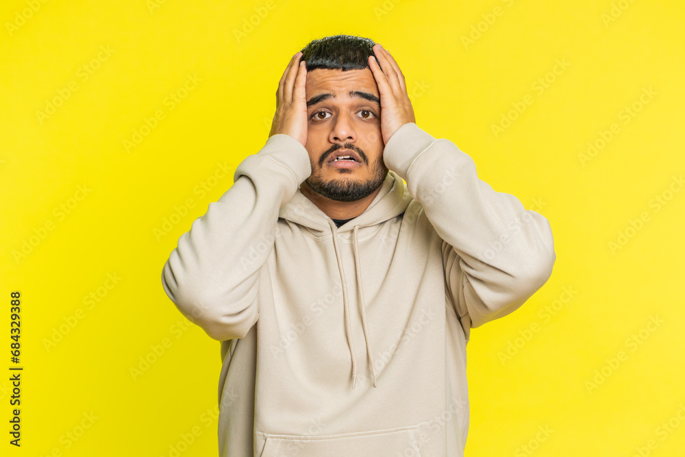 Sad young Indian man feeling hopelessness loneliness, nervous breakdown ...