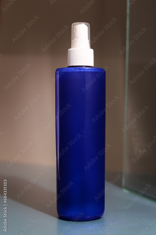 Vibrant Styling: Blue Hair Spray Takes Center Stage Against an Earthy ...