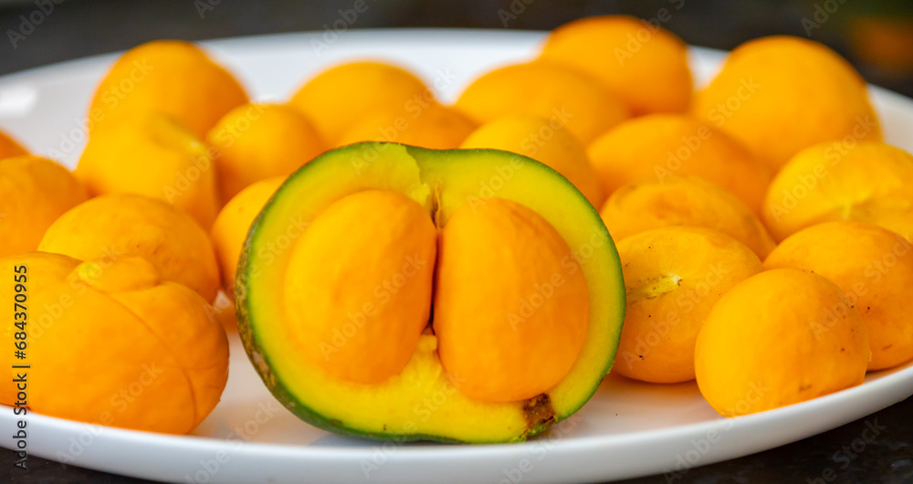 Typical ripe pequi fruit (caryocar brasiliense) in fine details and ...
