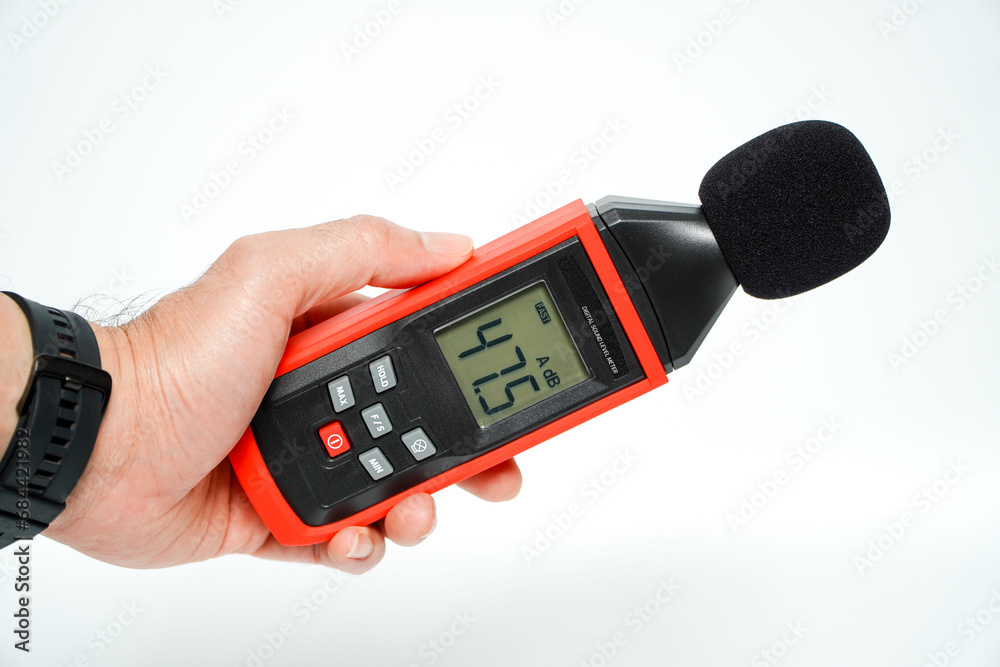 Hand holding sound level meter on a white background,Sound level meters ...