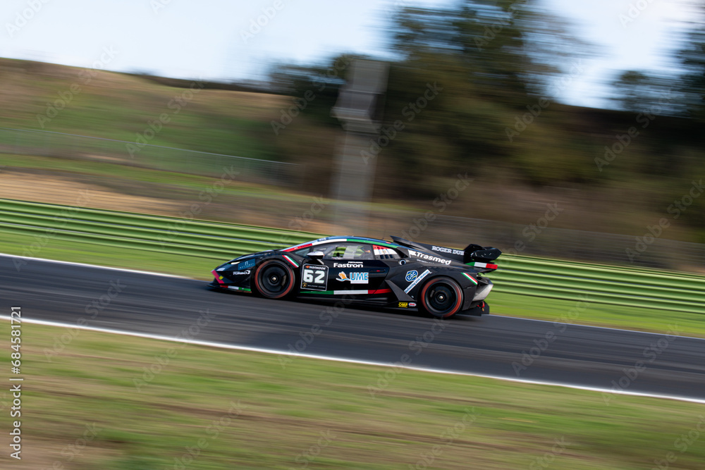 Lamborghini huracan racing supercar speed on racetrack, blurred motion ...