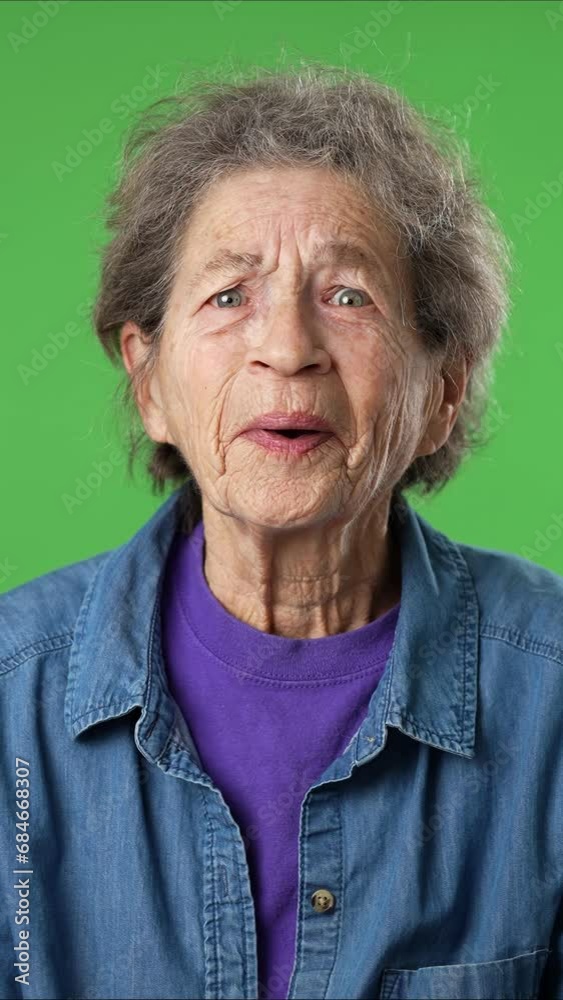 Vertical video sending virtual hugs, portrait of happy smiling elderly ...