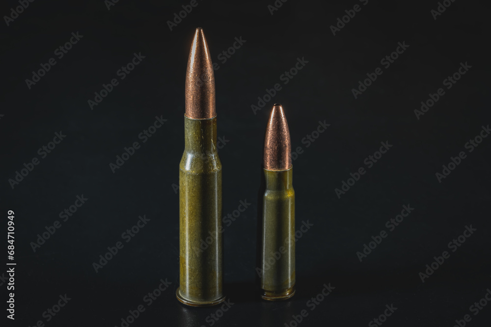 Cartridges 7.62x39mm and 7. 62x54r, close-up photo. Stock Photo | Adobe Stock
