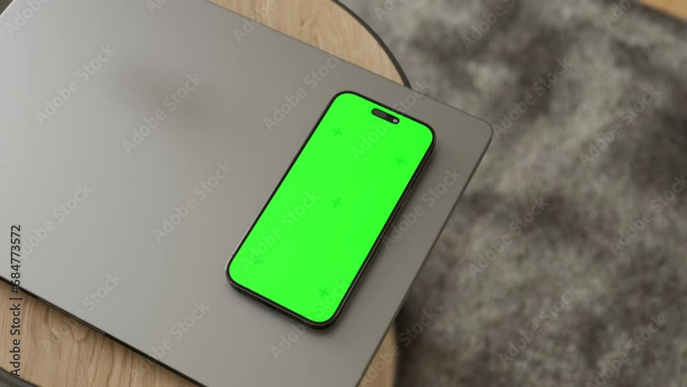 Smartphone place on coffee table, Green screen cellphone, Close up ...
