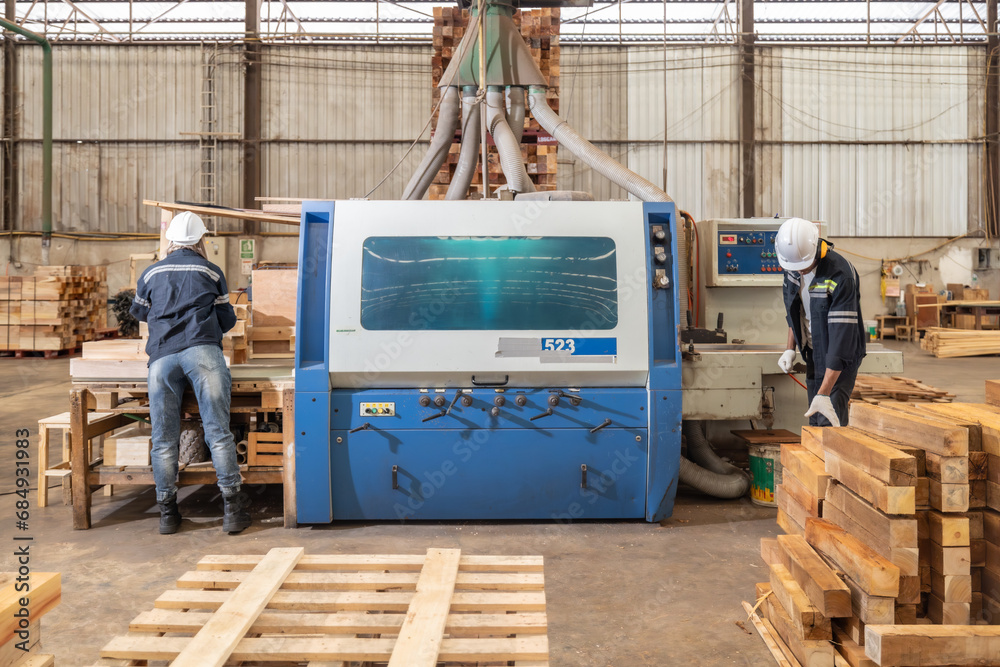 Woodworkers operate machines, tend lathes to cut, shape wood fixtures ...