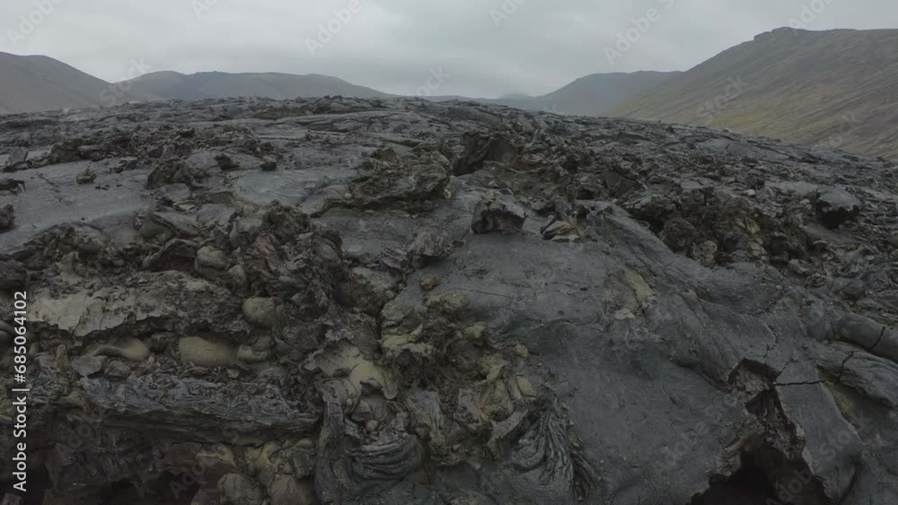 Vidéo Stock PAN SLOW MOTION SHOT - View of cracked lava crust or ...