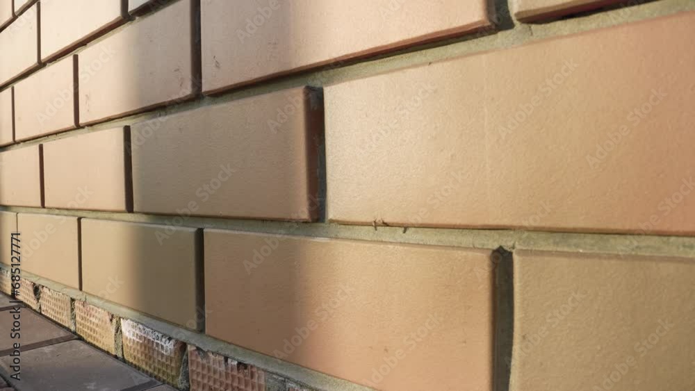 Decorative brick on the facade of a building, close-up. Brick wall ...